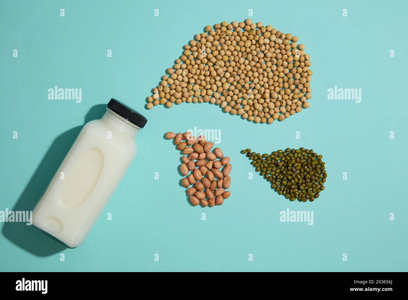 Few piles of soybeans, peanuts and green beans are displayed with a ...