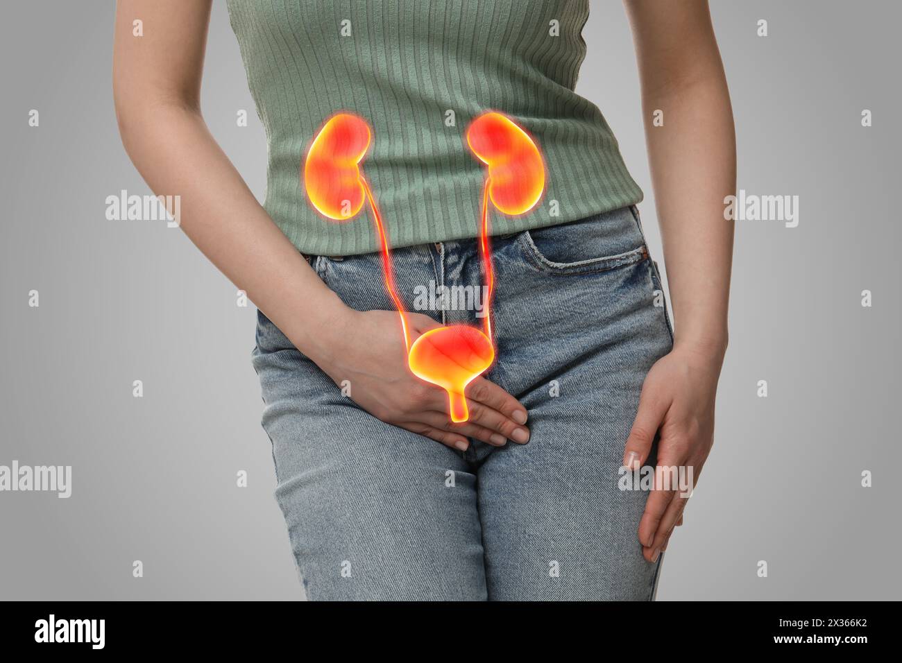 Woman suffering from cystitis on light grey background, closeup ...
