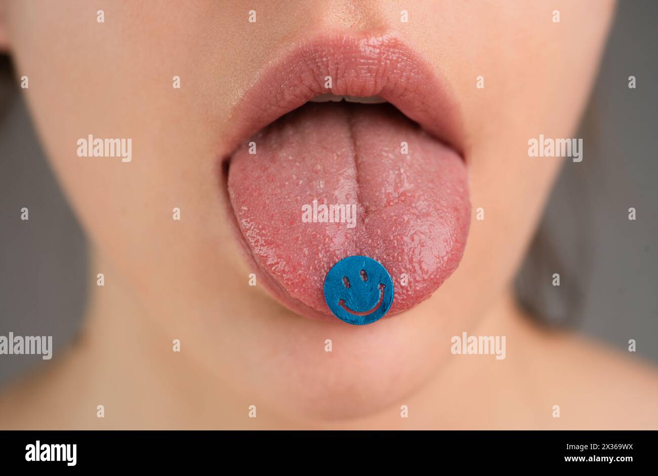 LSD. Drug addiction. Tongue with drugs. Psychedelic hallucinogens Stock ...