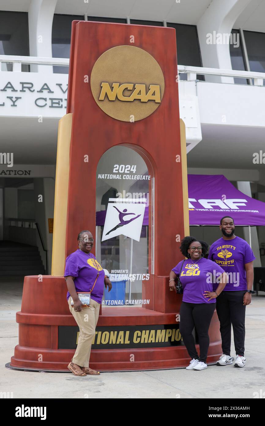 Baton Rouge, LA, USA. 24th Apr, 2024. A family poses with a large ...