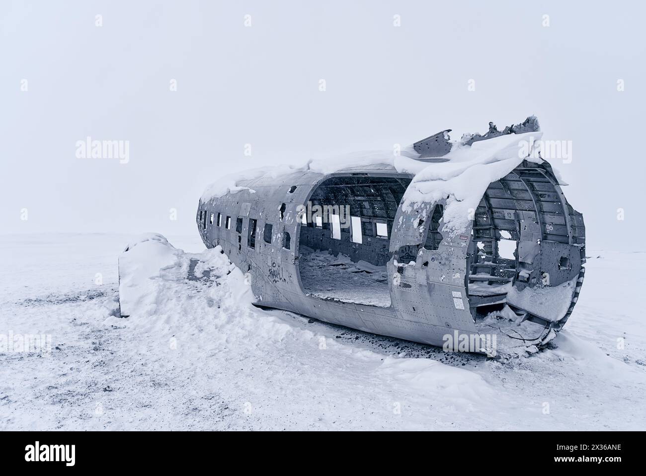 DC3 plane wreck, Iceland, photographed in winter snow Stock Photo - Alamy
