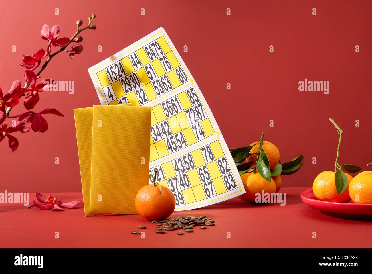 Concept of Lunar New Year with a bingo card displayed with envelopes ...
