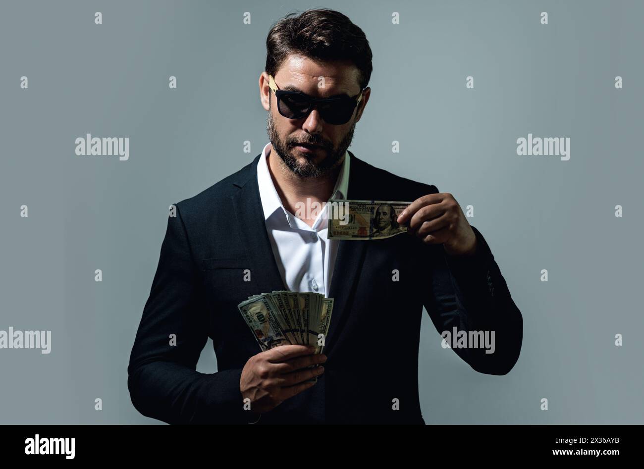 Business man with money banknotes. Male entrepreneur with dollar bills ...
