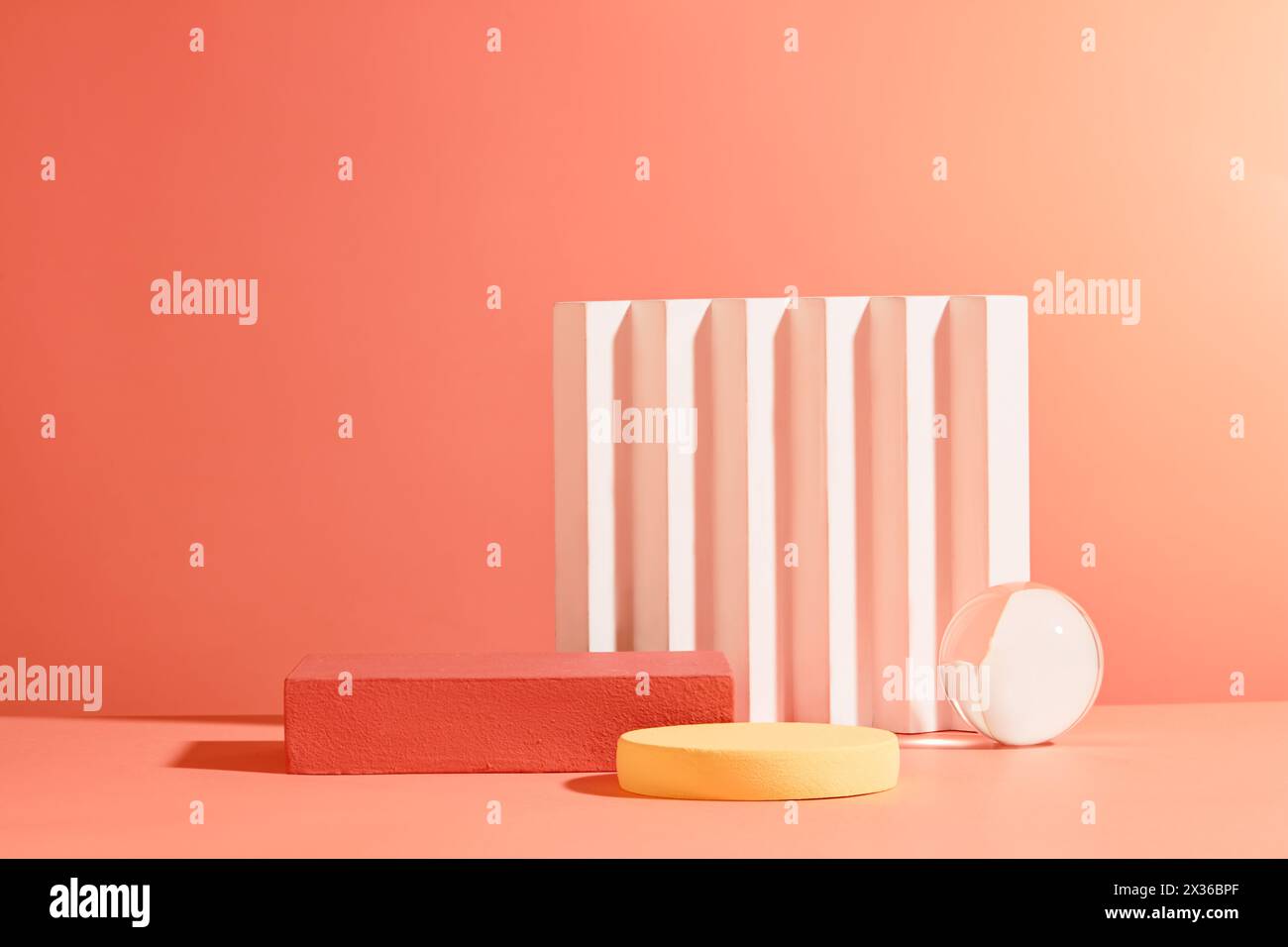 Two empty podiums in rectangle and round shaped arranged with a ...