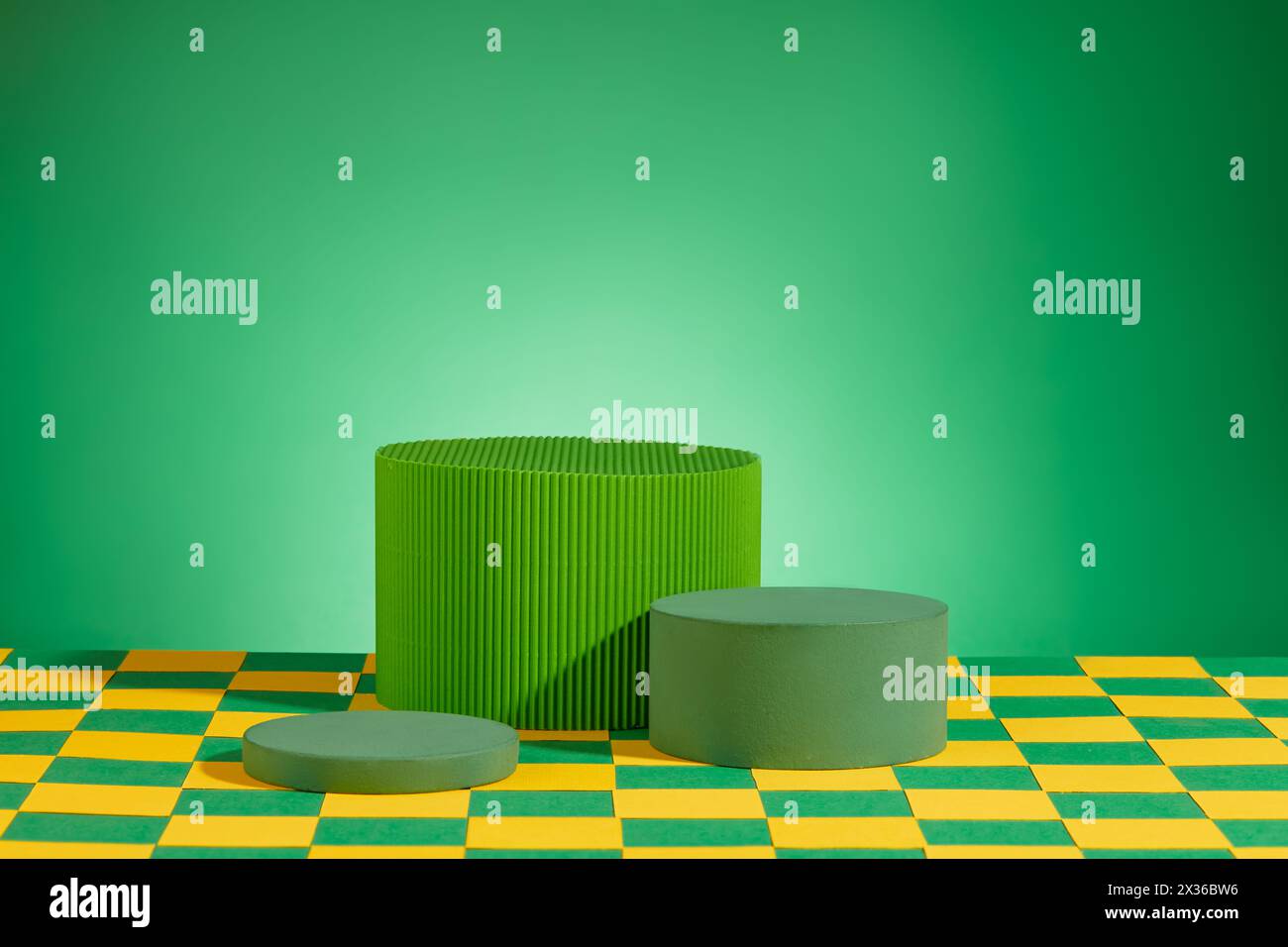 Several podiums in green color are displayed on green and yellow ...