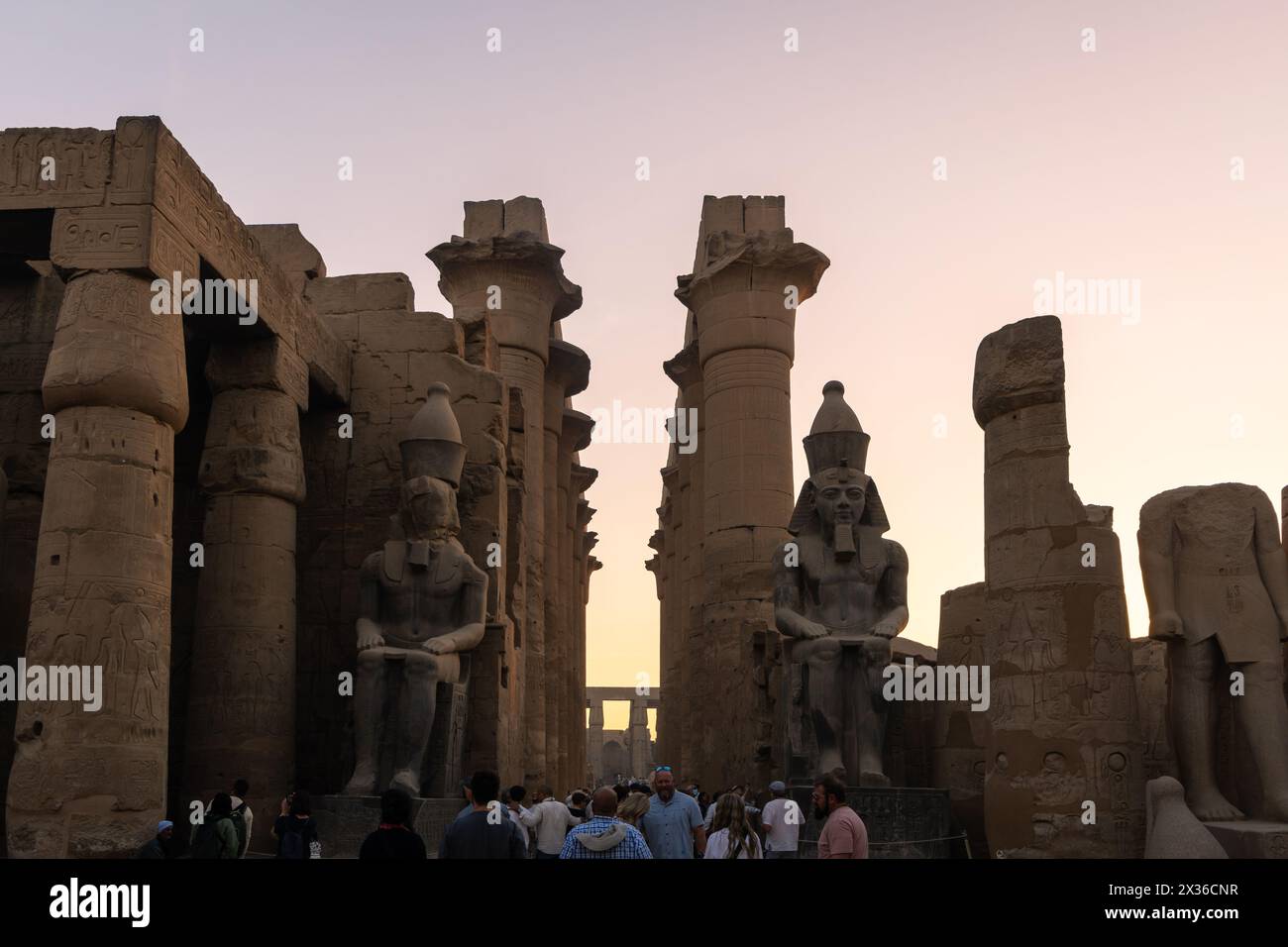 Luxor, Egypt - November 25 2023: Tourists visit the famous Luxor Temple ...