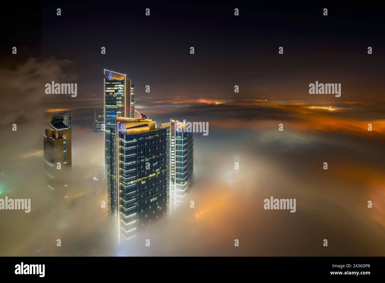 Aerial view of Qatar Energy building west bay during fog Stock Photo ...