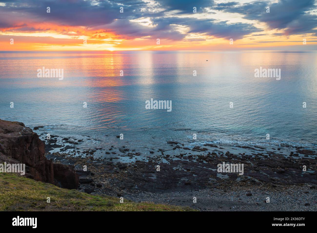 Dramatic sunset with fishing boat viewed from Hallett Cove Beach, South ...