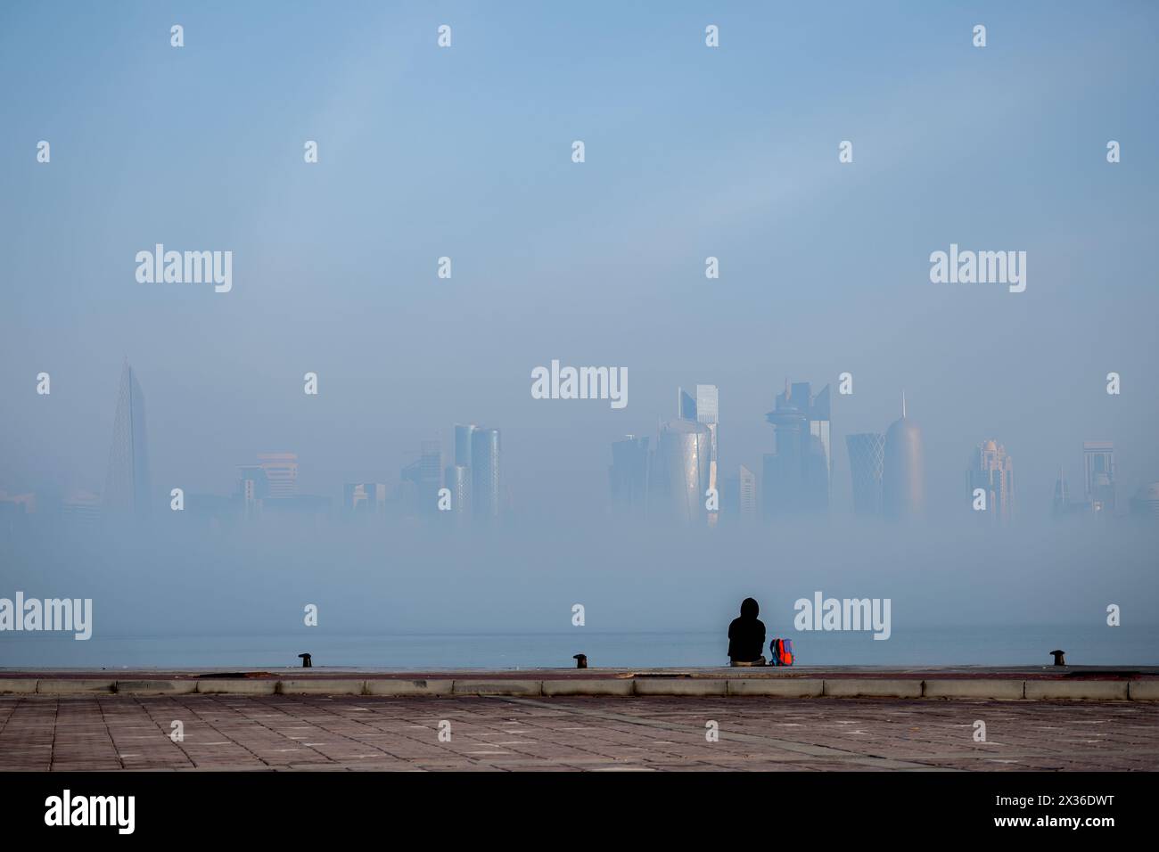 Foggy Doha Corniche early morning winter days. Doha Skyline in Fog ...