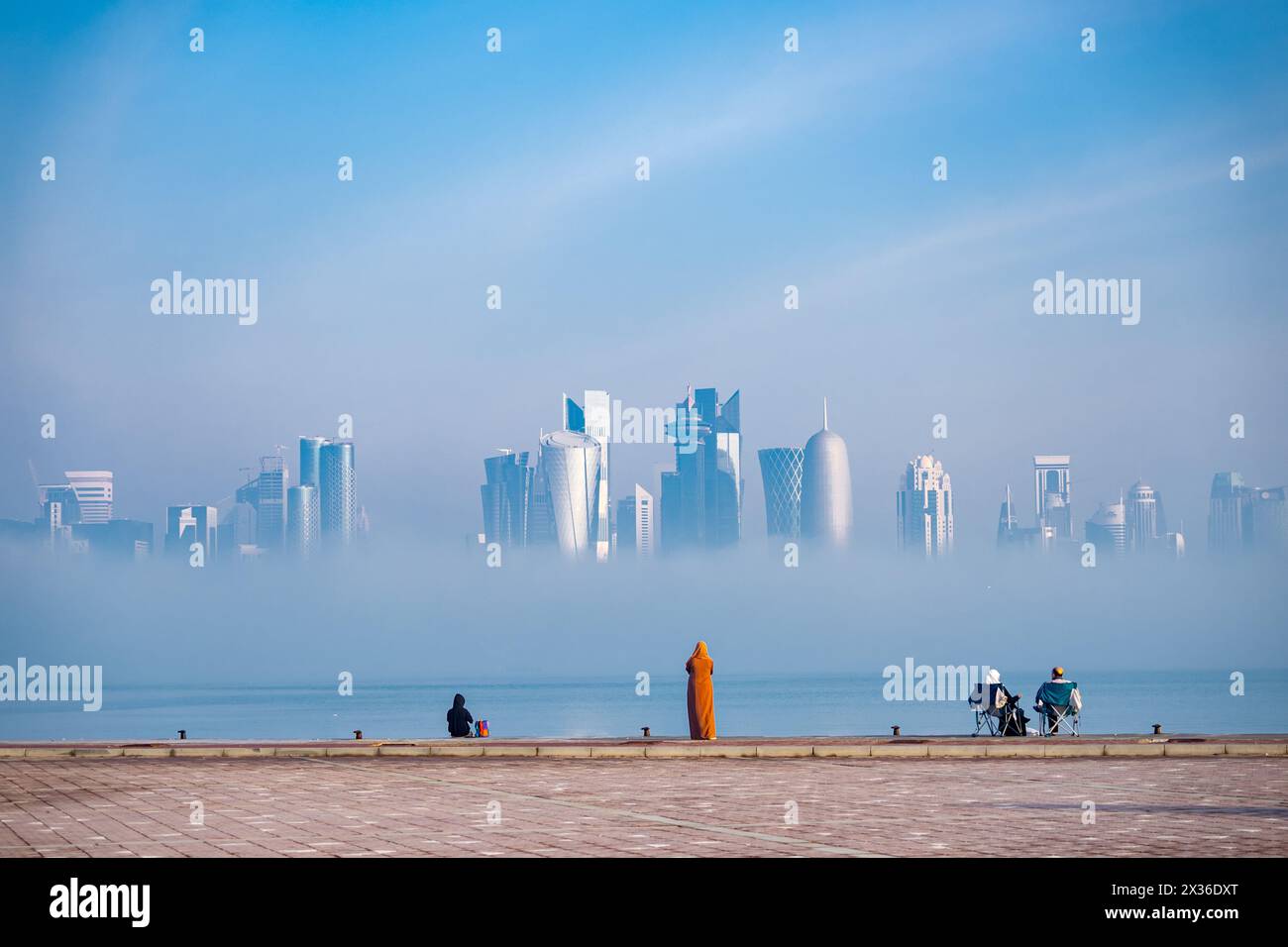 Foggy Doha Corniche early morning winter days. Doha Skyline in Fog ...