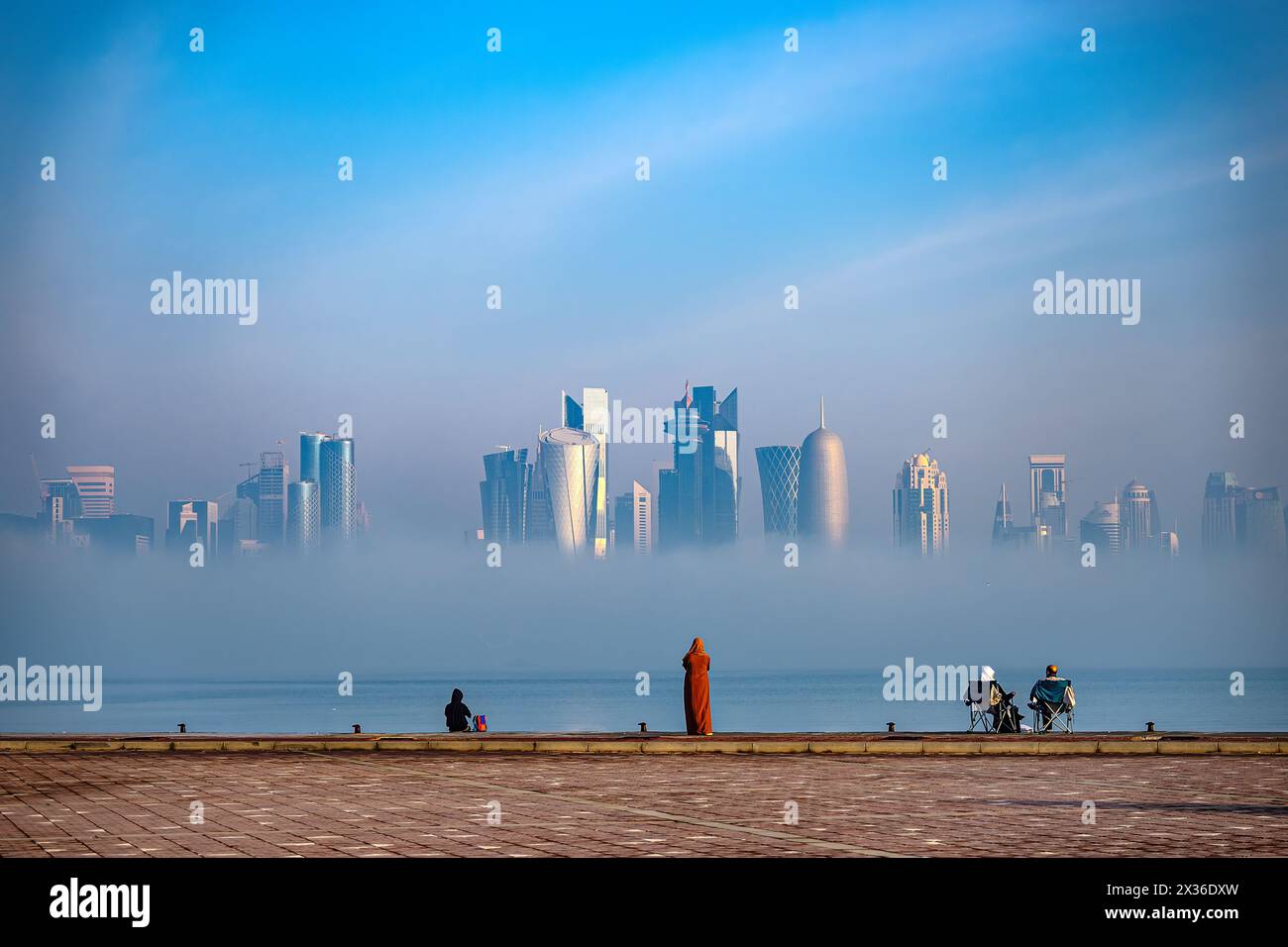 Foggy Doha Corniche early morning winter days. Doha Skyline in Fog ...
