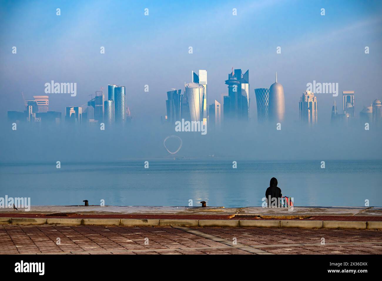 Foggy Doha Corniche early morning winter days. Doha Skyline in Fog ...