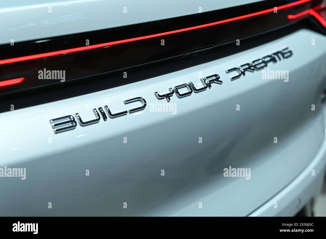 Peking, China. 25th Apr, 2024. The BYD logo on the rear of a car at the ...
