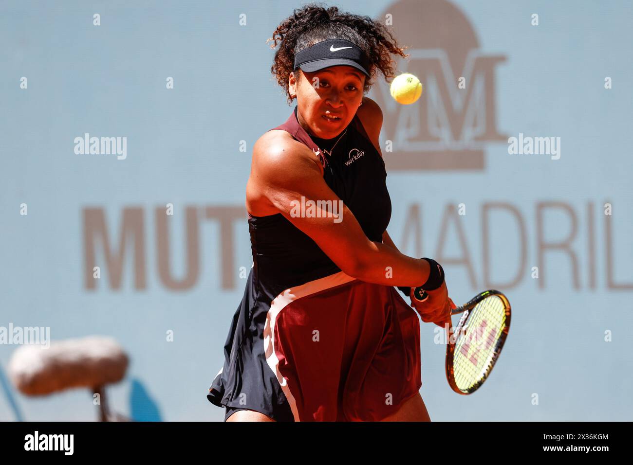 Naomi Osaka of Japan in action against Greet Minnen of Belgium during ...