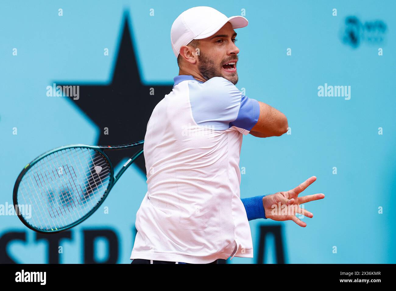 Borna Coric of Croatia in action against Benjamin Hassan of Germany ...