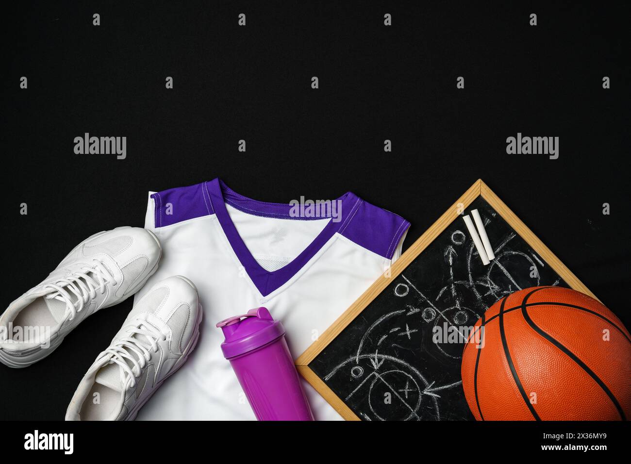 Basketball Gear Including Sneakers, Ball, and Play Strategy Board on ...