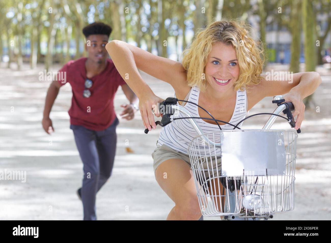 Man chasing girl hi-res stock photography and images - Alamy