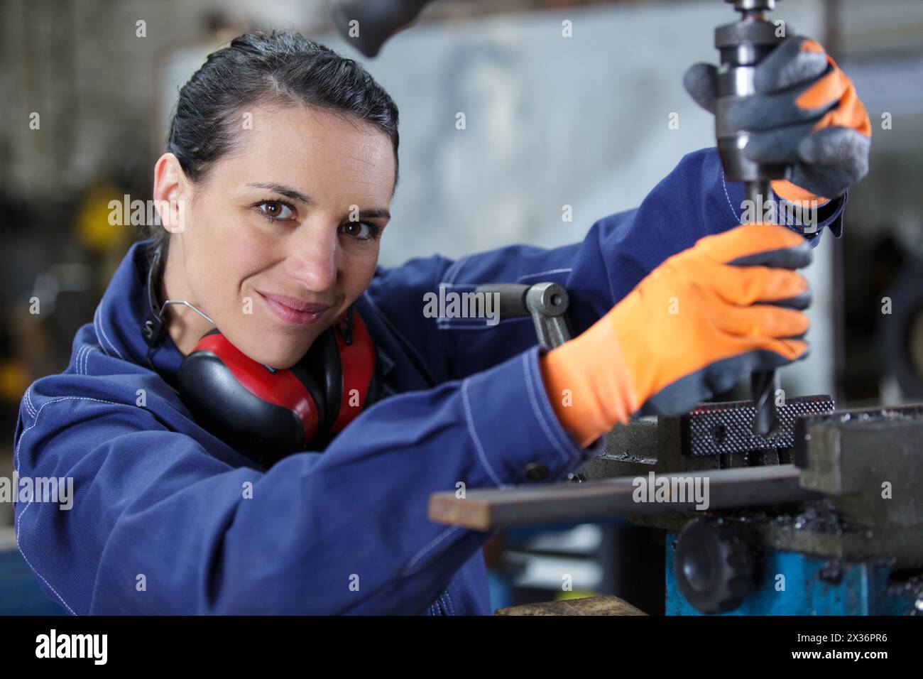 attractive milling machine female staff Stock Photo - Alamy