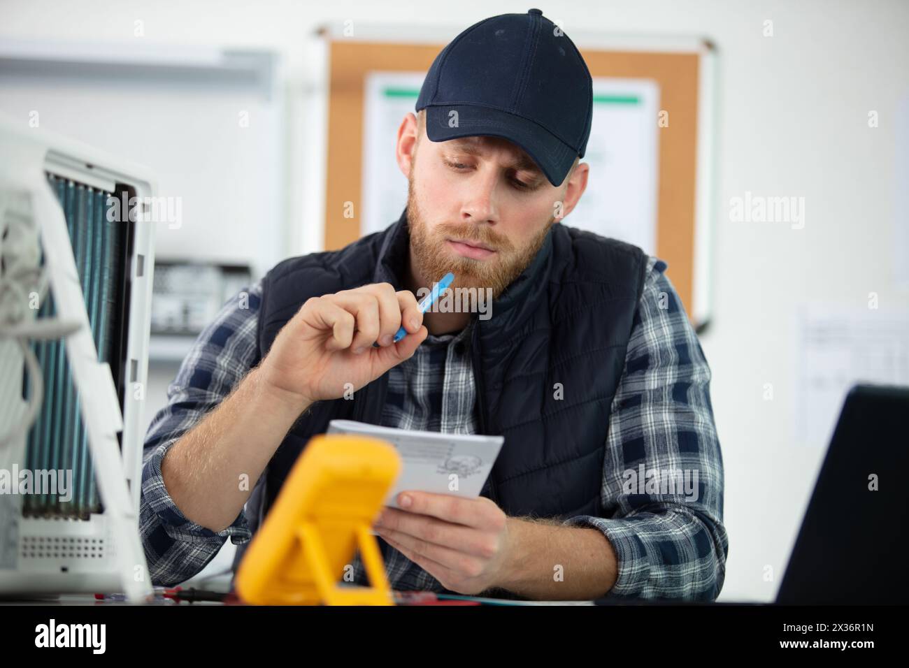 Electronic technician repairing computer hi-res stock photography and ...