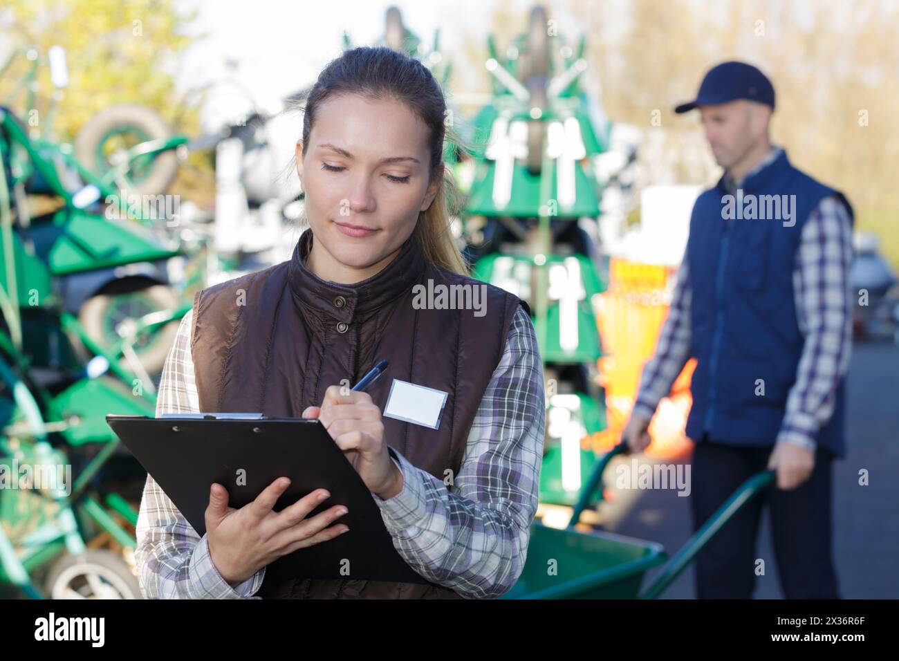 female engineer taking notes outside a metallurgy factory Stock Photo ...