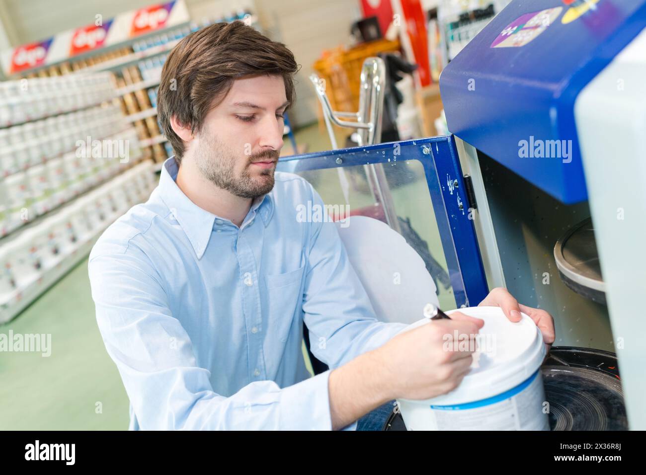 Paint store employee hi-res stock photography and images - Alamy