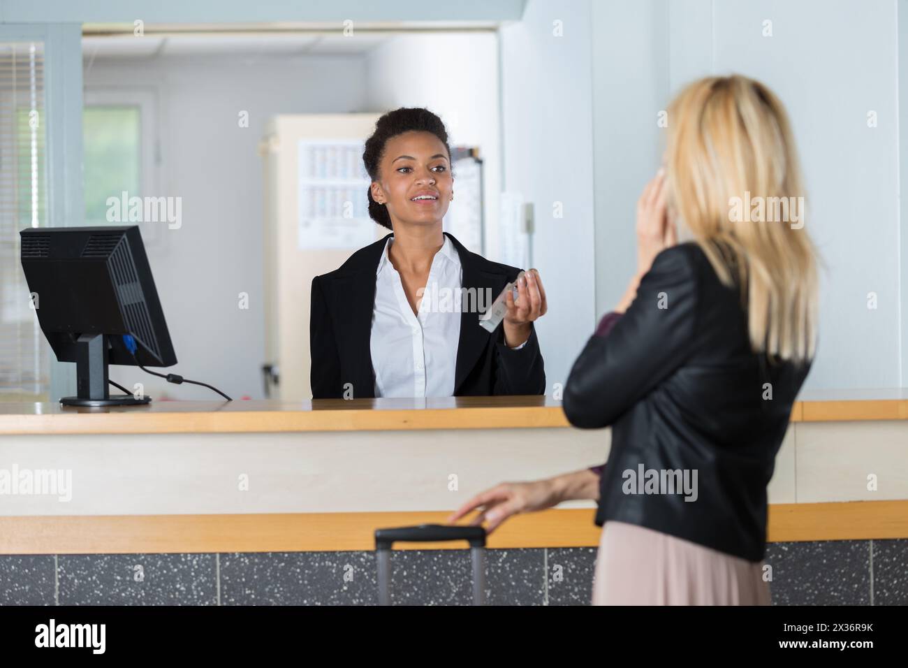 Female guest worker hi-res stock photography and images - Alamy