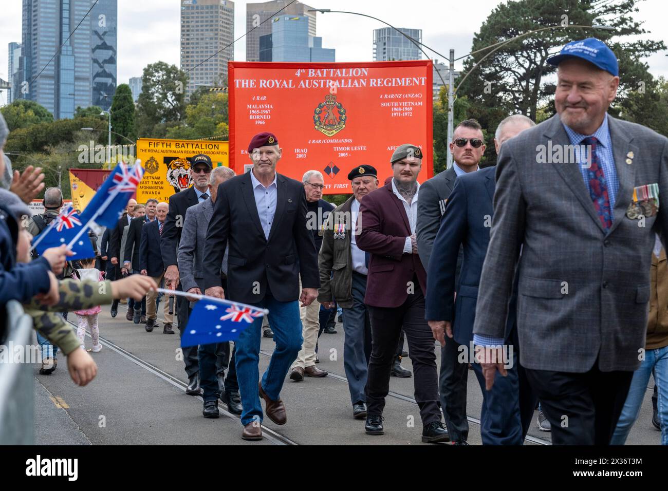 Soldiers, return servicemen and women march to the Shrine of ...