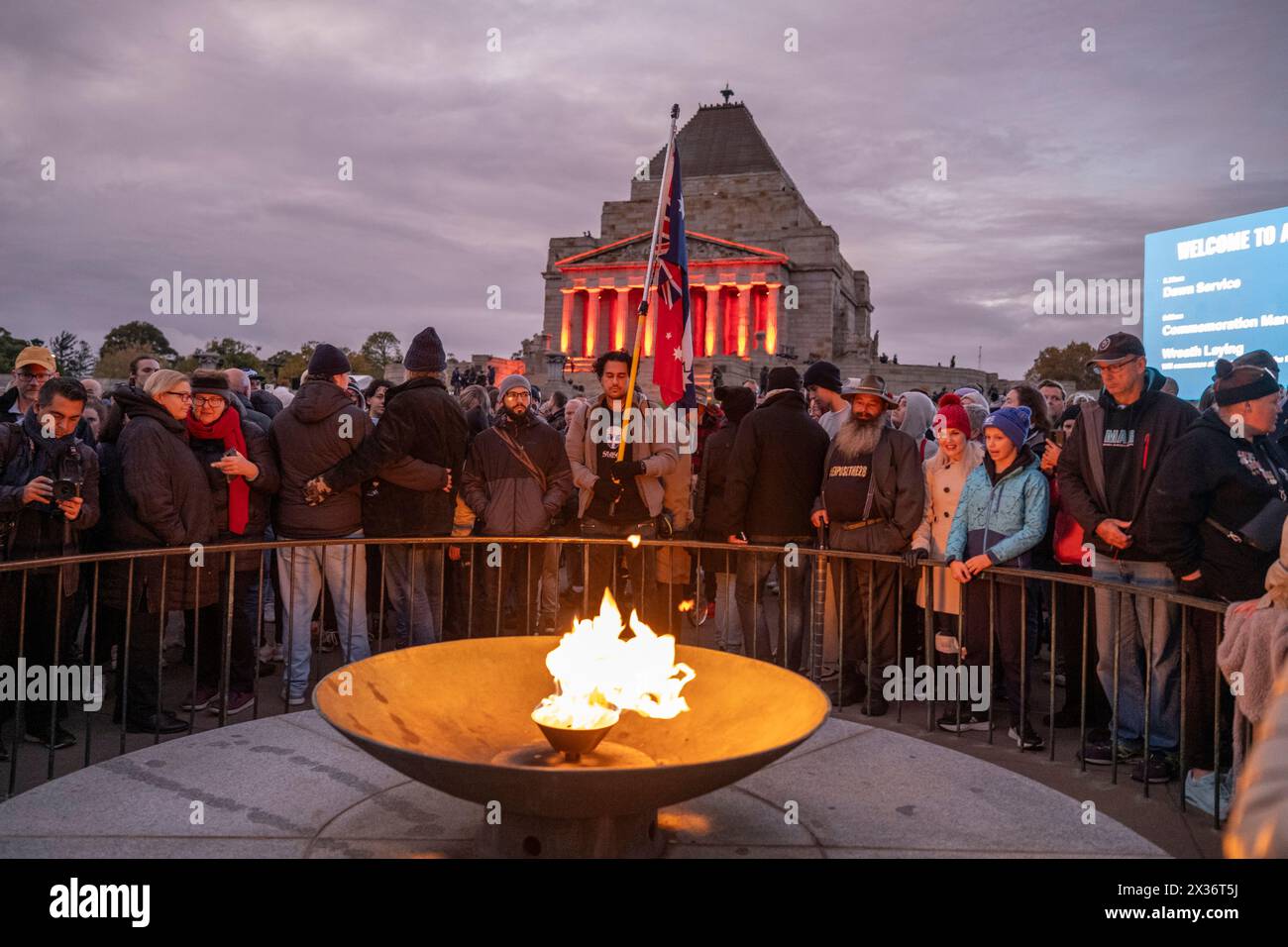 People gather to pay their respects at the Shrine of Remembrance on ...