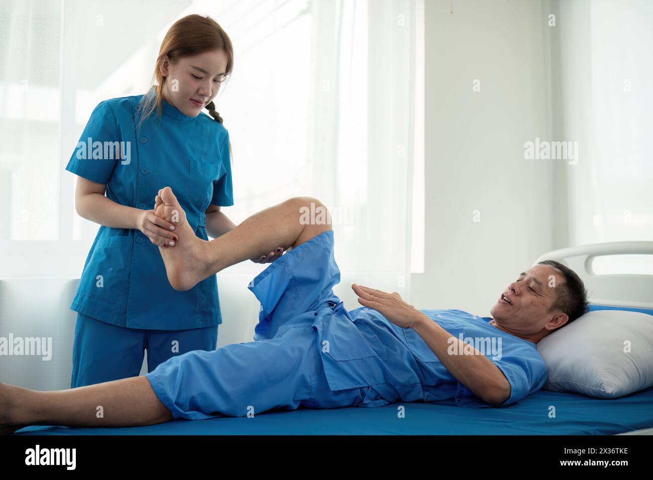 Asian female physical muscle doctor hi-res stock photography and images - Alamy