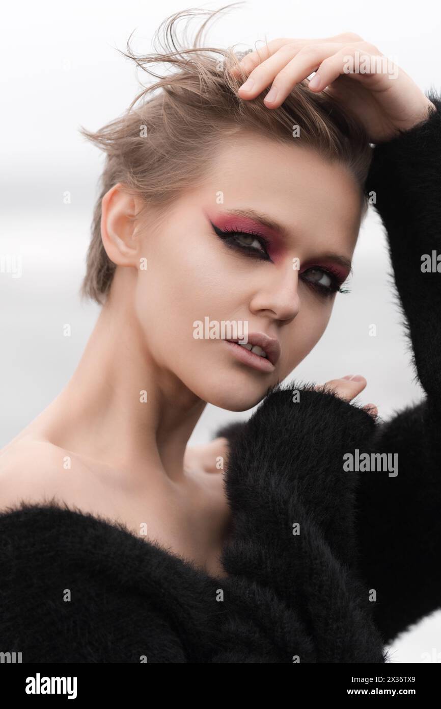 Portrait gorgeous blonde woman is epitome of sensuality. She is wearing ...