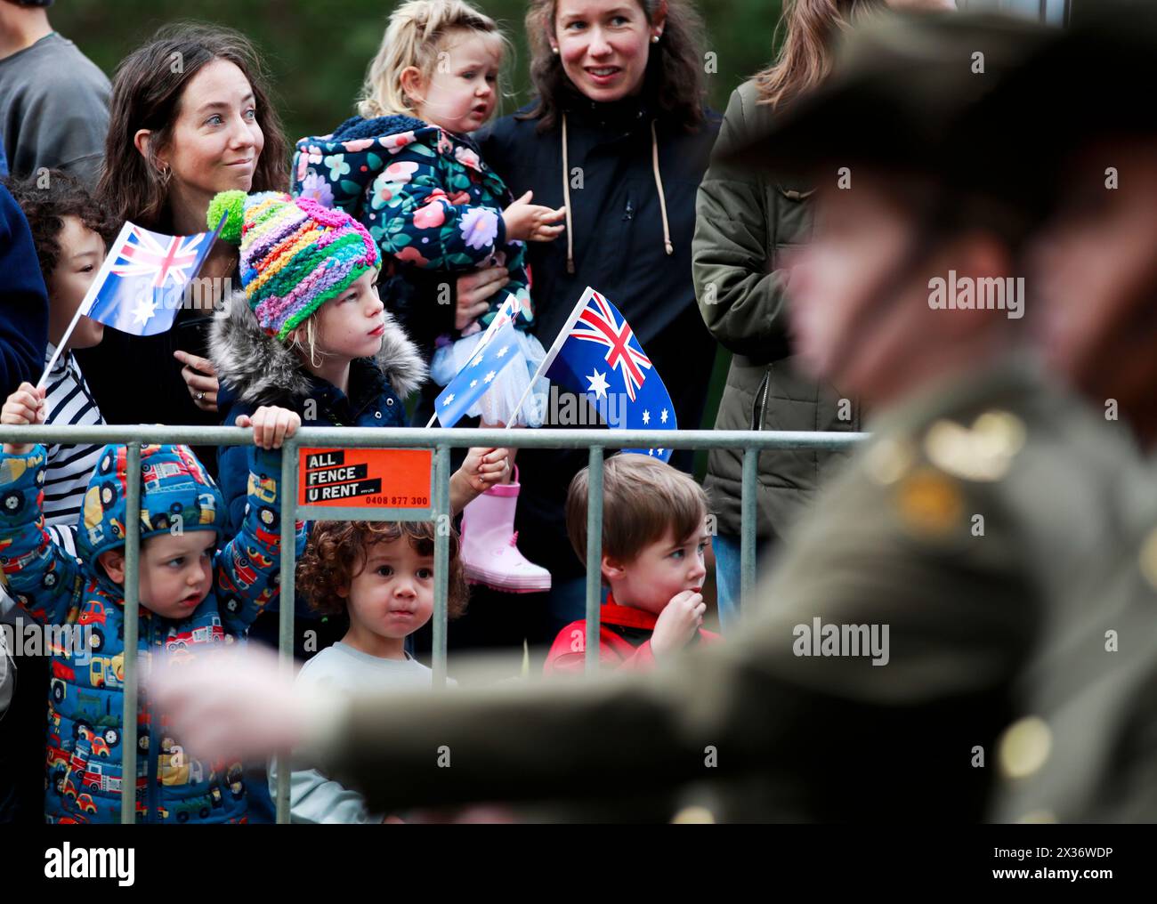 Perth, Australia. 25th Apr, 2024. People watch the Anzac Day parade in ...
