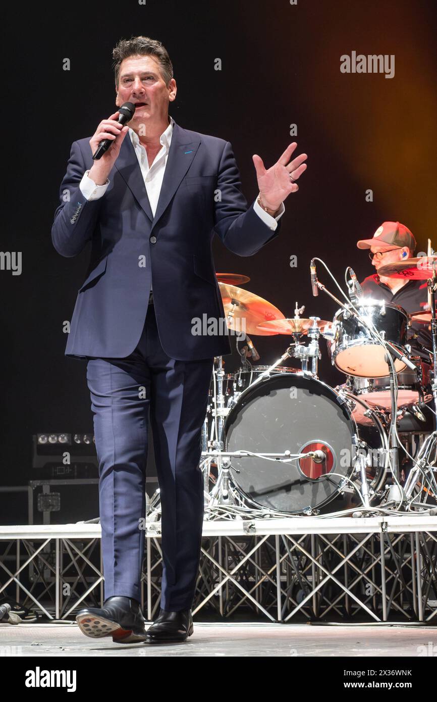 Tony Hadley, stage name of Anthony Patrick Hadley, is singing on stage ...