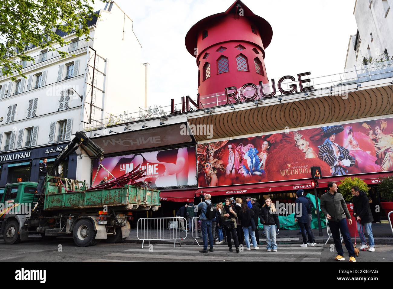 Wings of the famous Moulin Rouge of Montmartre fell down the street during the night of April ...