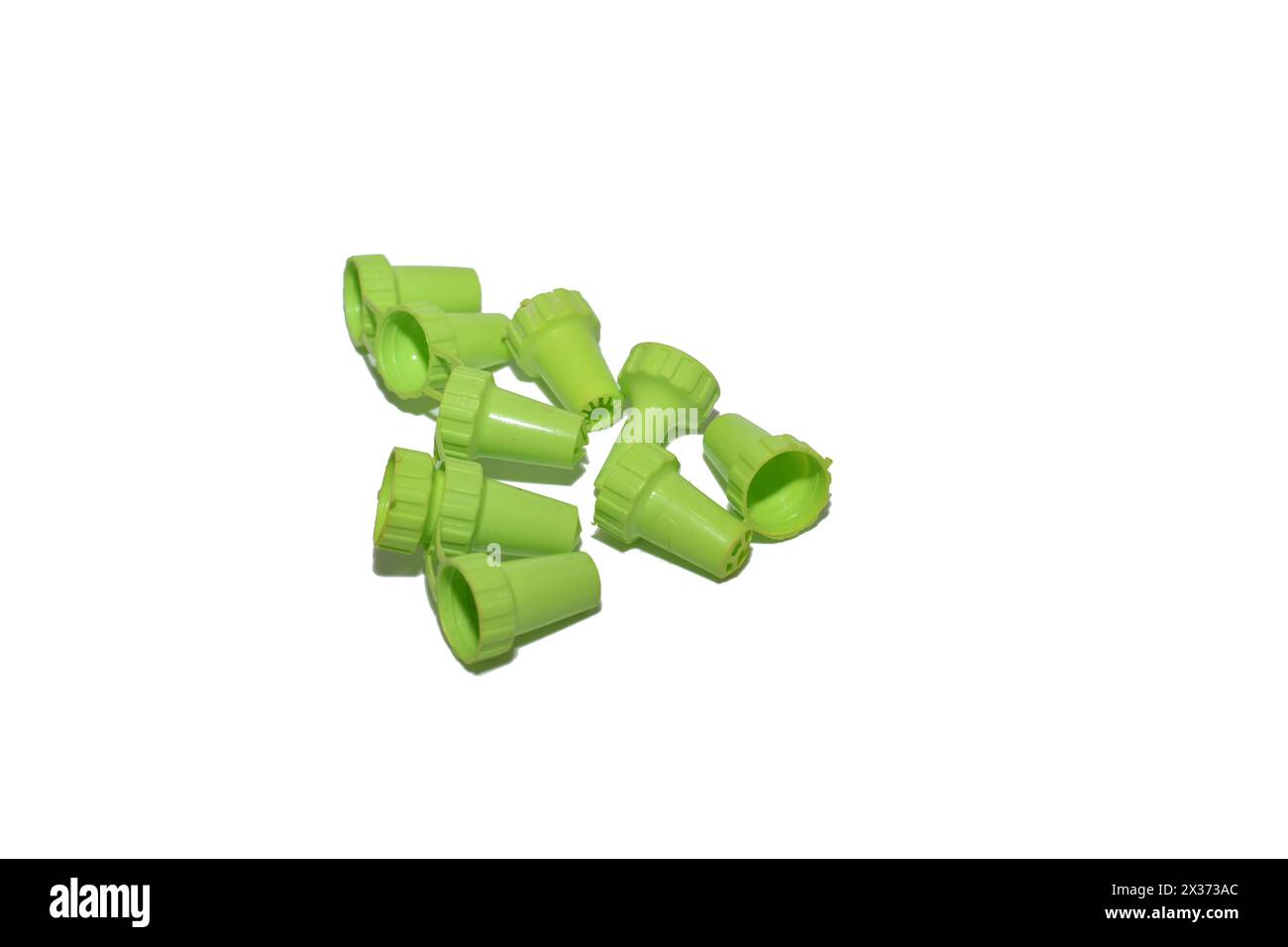 On a white background there are various shapes of nozzles for a pastry ...