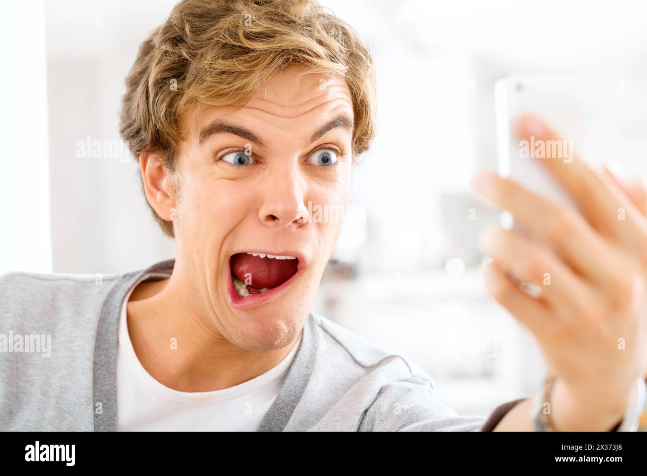 Crazy, man and online selfie with funny post to social media, website ...