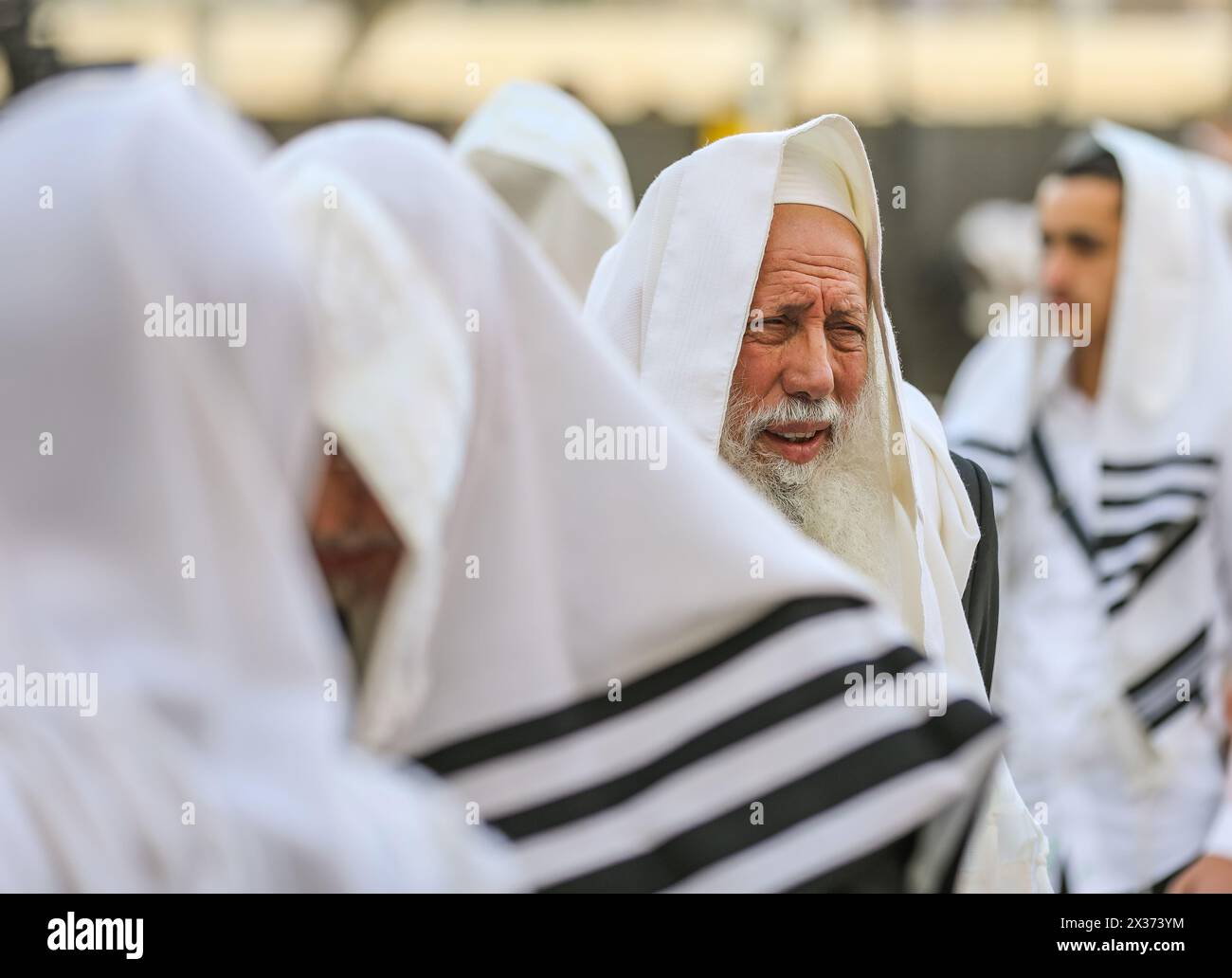 Jerusalem, Israel. 25th April 2024. A Jewish man covered with a tallit ...