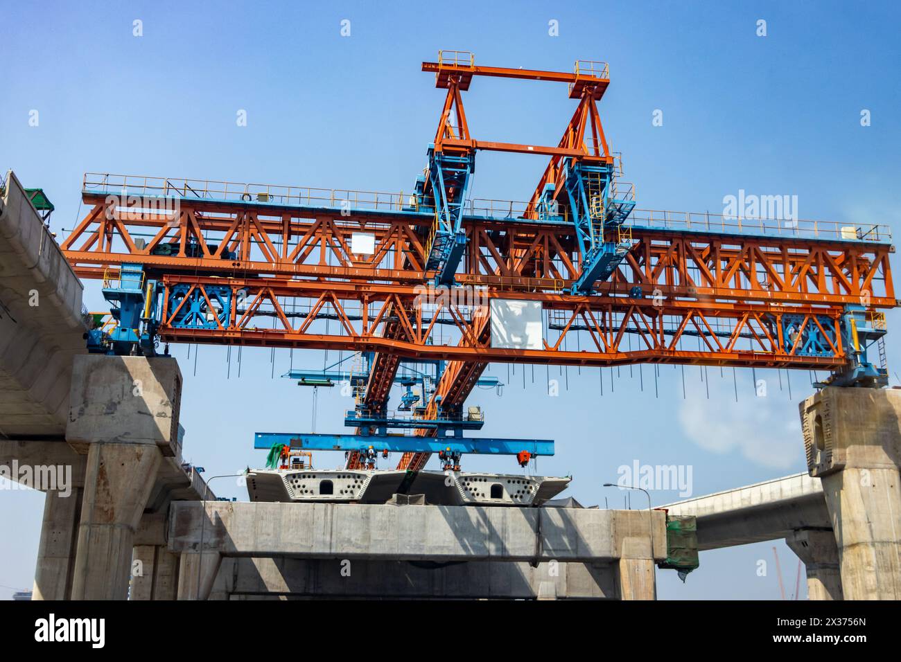 A construction of elevated precast segmental bridge over highway in ...