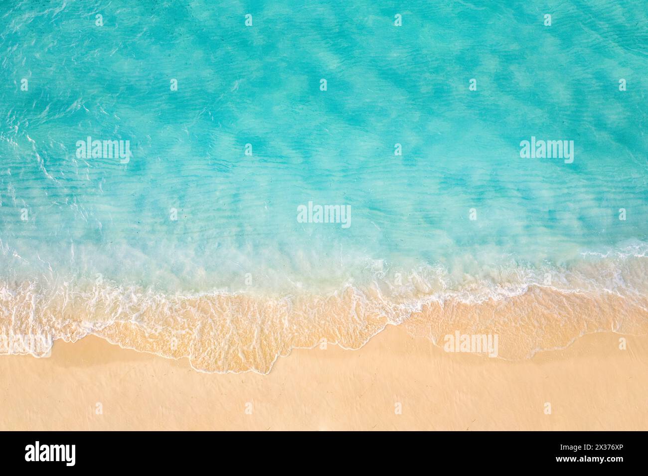 Top view on coast waves on beach aerial view, crystal clear water ...