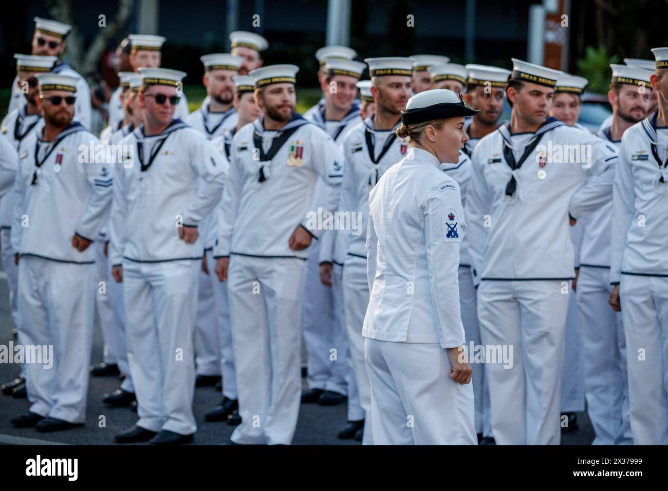 Royal Australian Navy service people of the HMAS Dechaineux prepare to ...