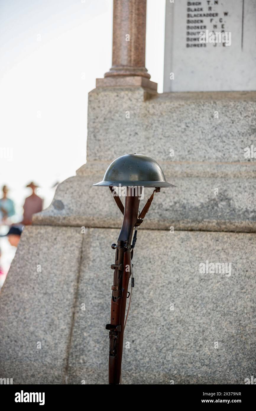 A Lee Enfield rifle and First World War-era helmet stood at the Cairns ...