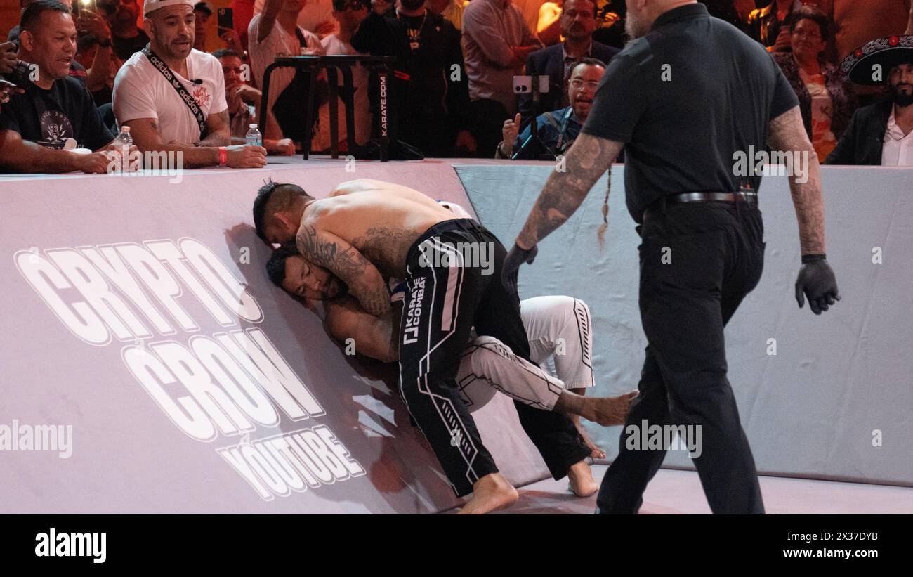 Efrain Escudero holds Rafael Alves against the wall during Karate ...