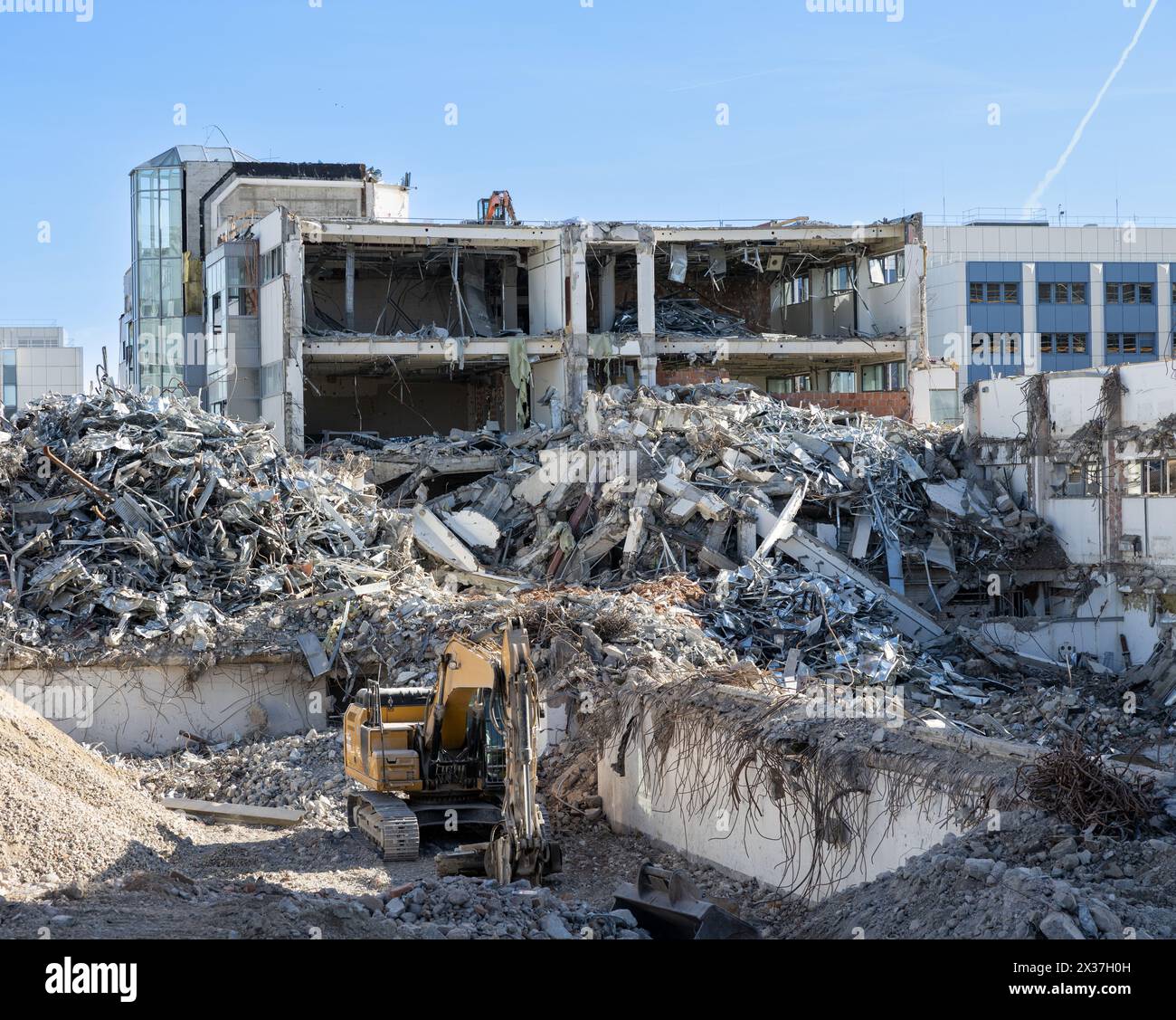 Office building being demolished Stock Photo - Alamy