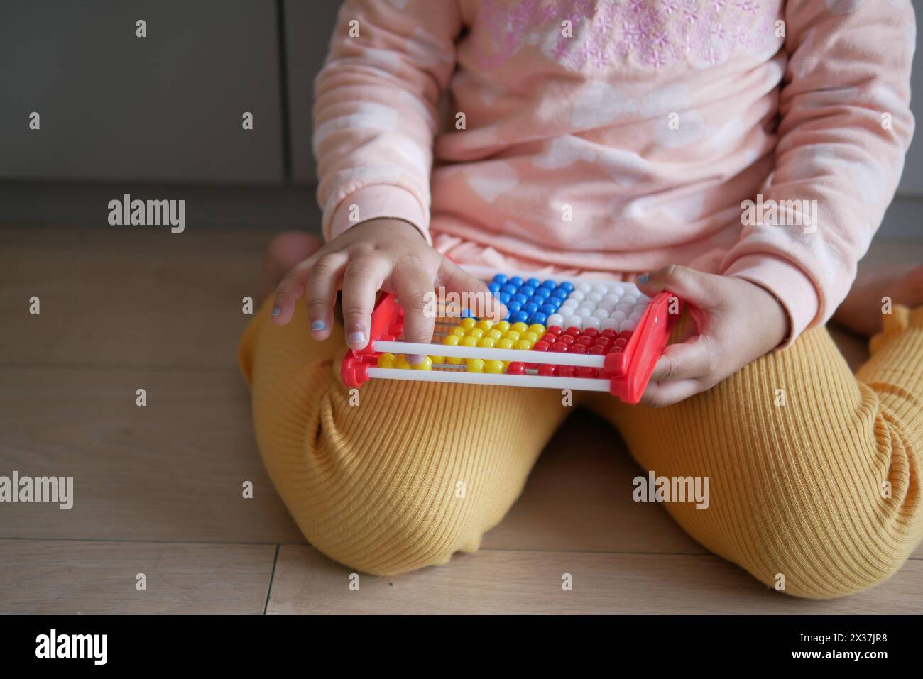 Toddler playing counting math learning hi-res stock photography and ...