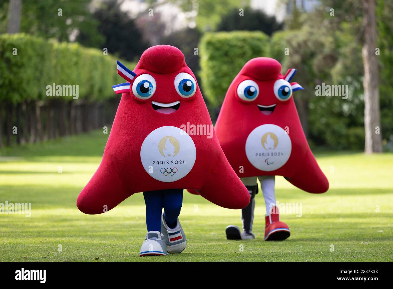 Paris, France. 25th Apr, 2024. An Olympic Phryge mascot and a ...