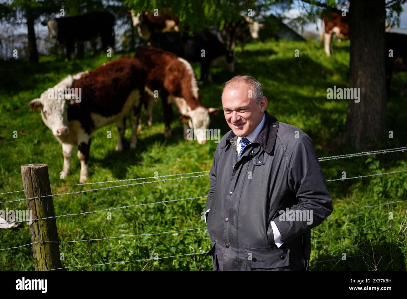 Liberal Democrat leader Sir Ed Davey during a visit to Treflach Farm in ...