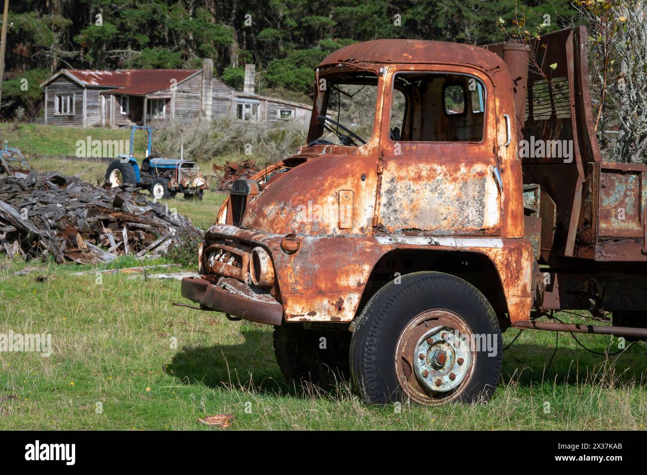 Rusty Thames Trader truck and old houses at Endeans Mill, near ...