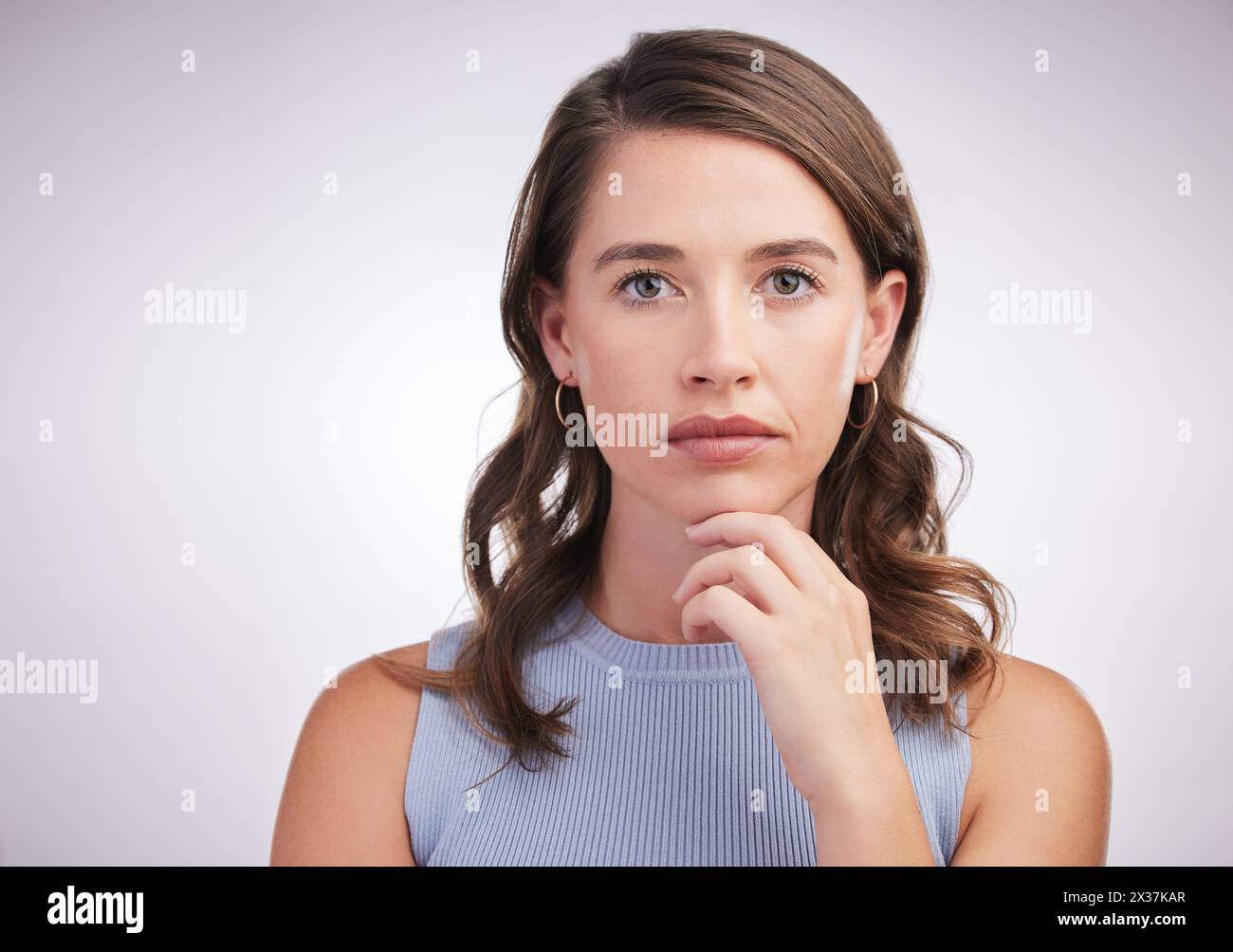 Portrait, woman and thinking in white studio background for serious ...