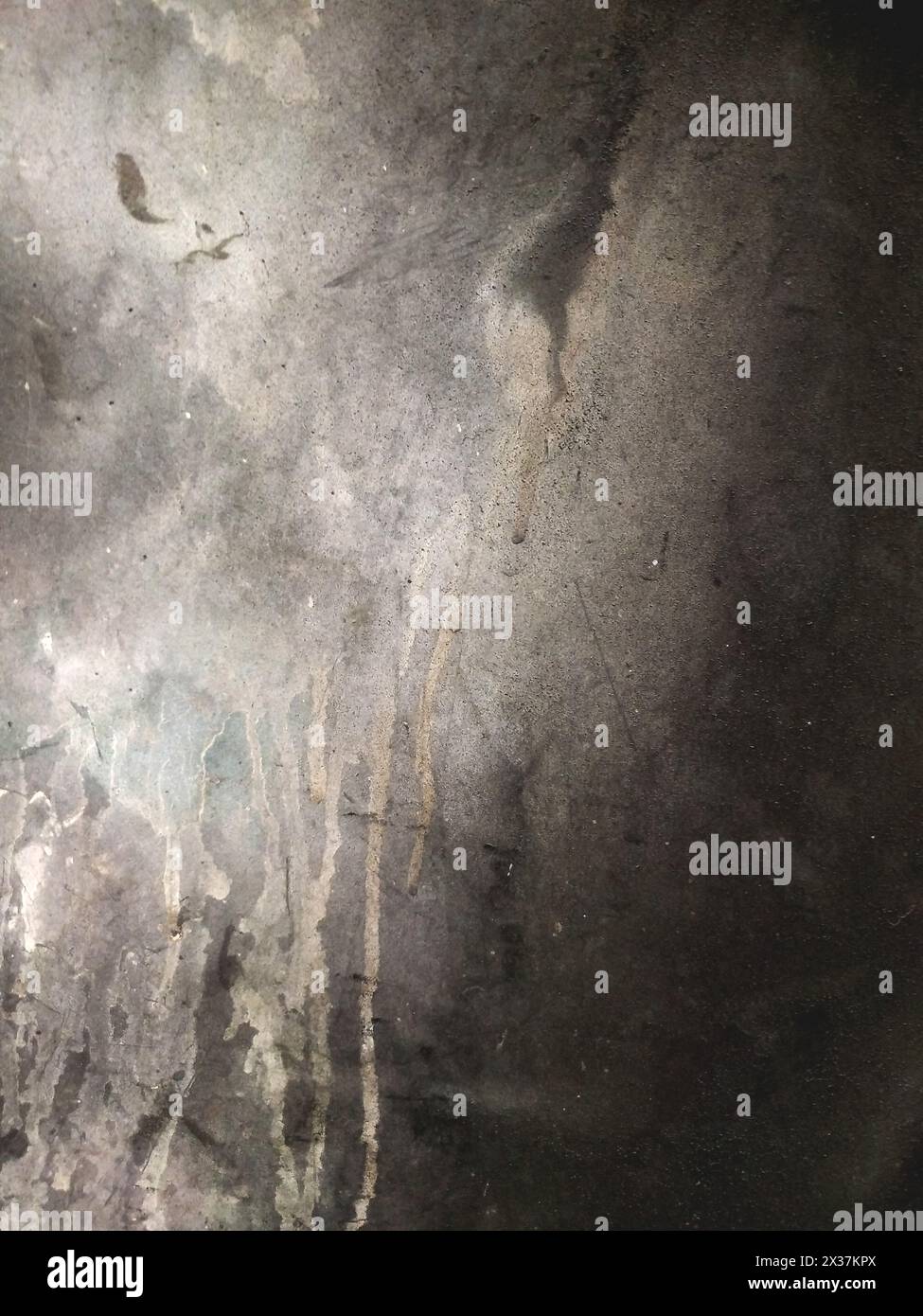 Dried spray paint stains on a textured surface with aesthetically ...