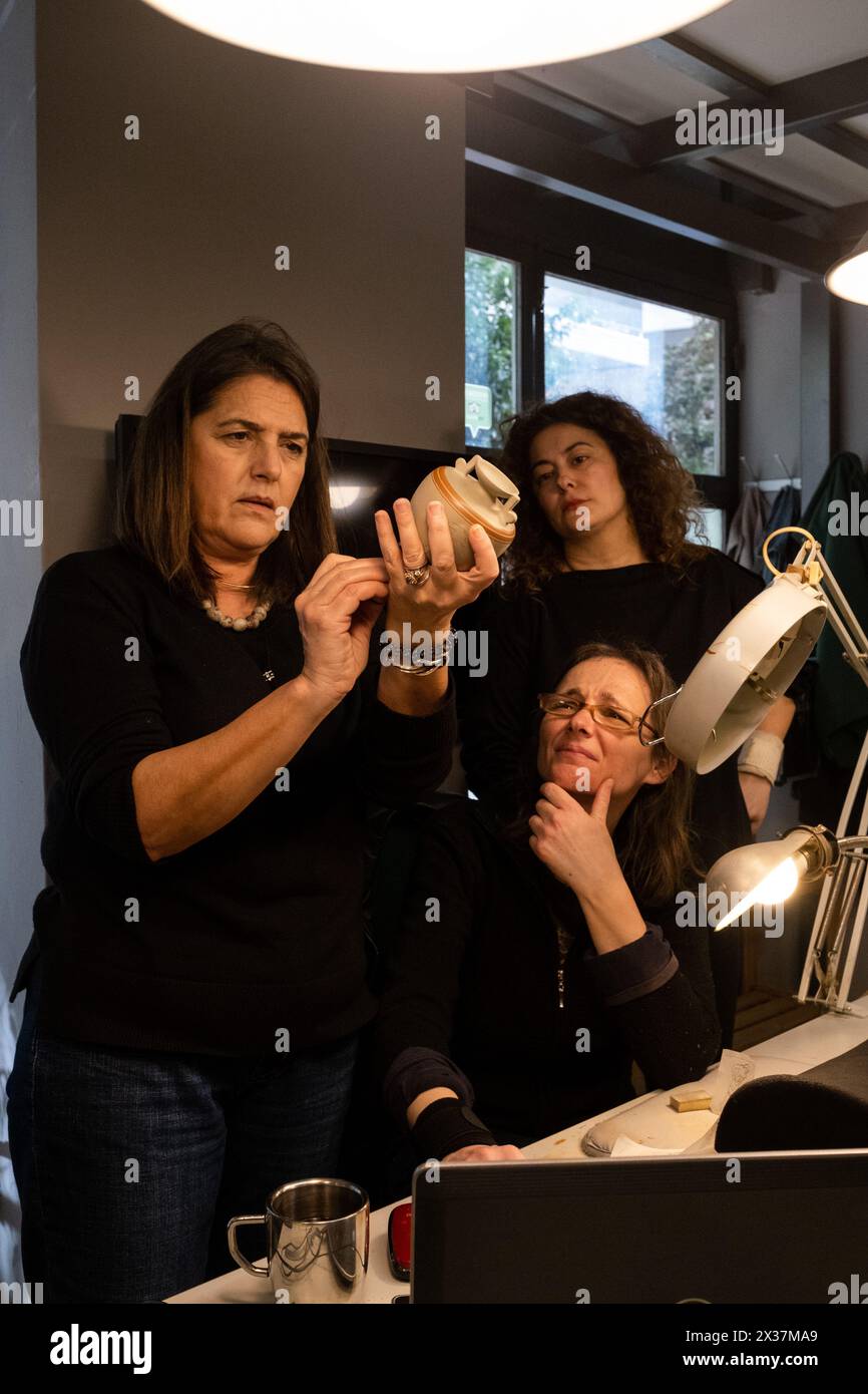 Eleni Aloupi-Siotis, founder, and her colleagues carefully study the ...