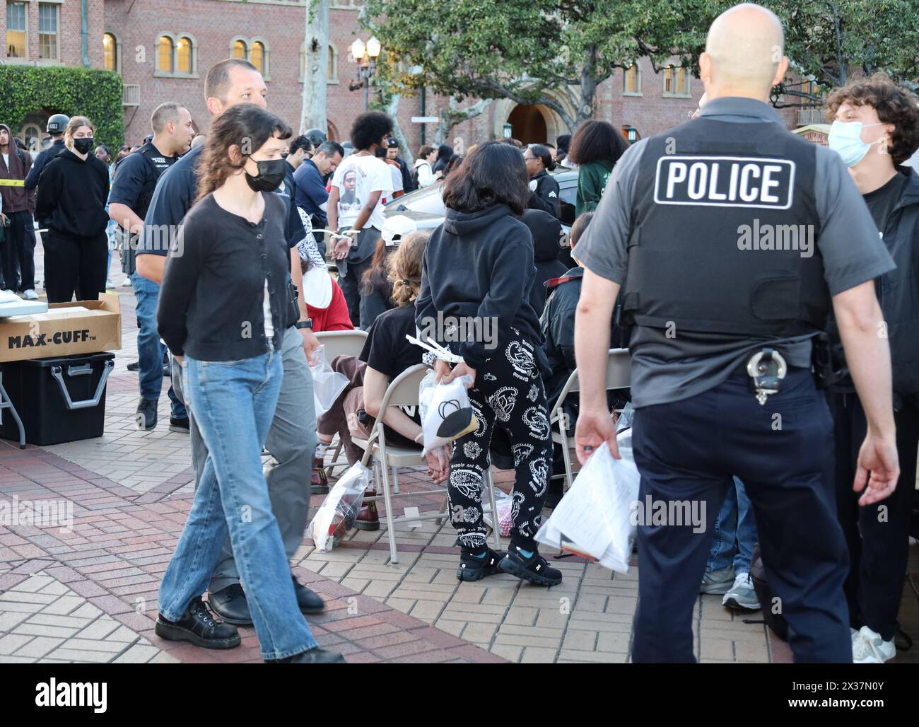 Los Angeles, California, U.S.A. 24th Apr, 2024. A woman in zip ties and ...